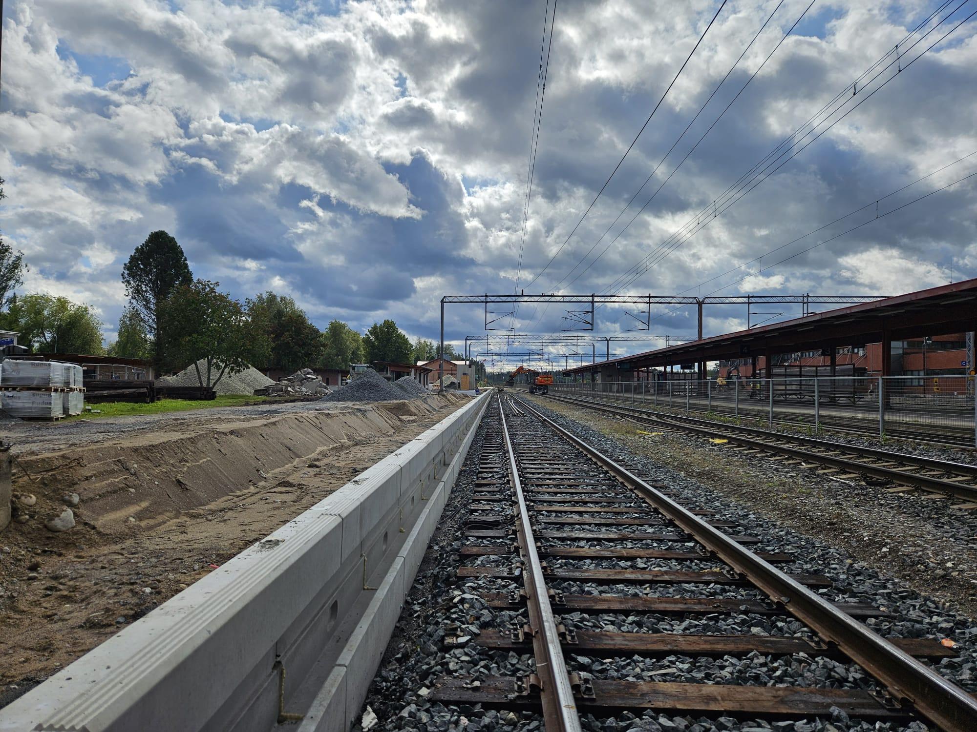 RAISING THE PASSENGER PLATFORMS AND IMPROVING THE EXTERIOR APPEARANCE ...